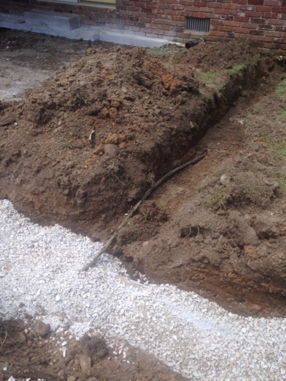 PLACING CLEAN ROCK - J&L Underground Construction